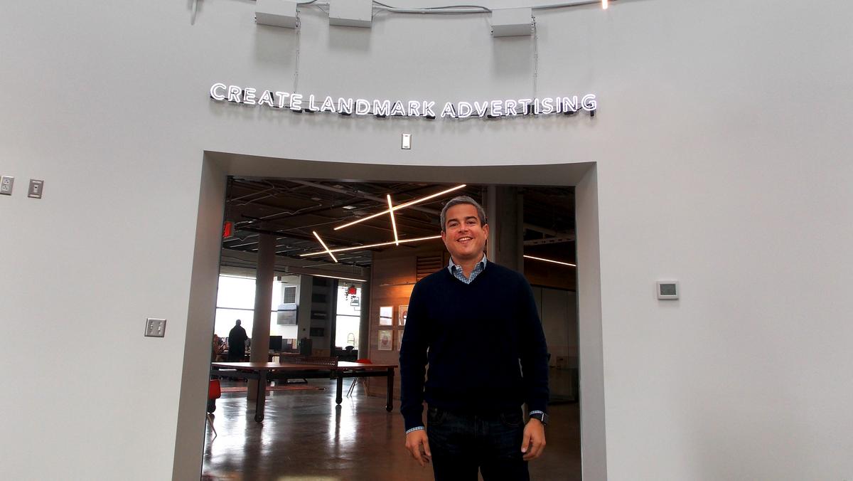 Orange Barrel Media unveils new HQ built around concrete silos and filled with furniture made of ...