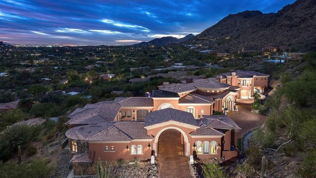 This $9.9 million mansion sits on the side of Mummy Mountain in ...
