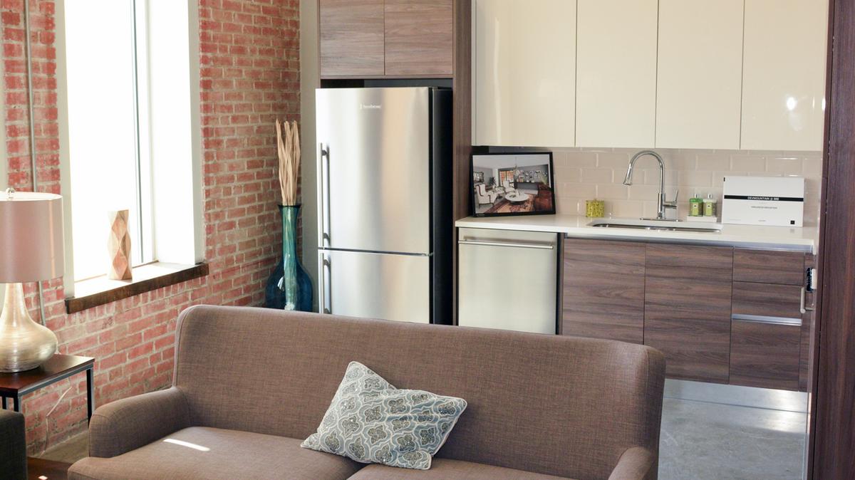 An inside look at the lofty apartments in the Butler Brothers Building ...