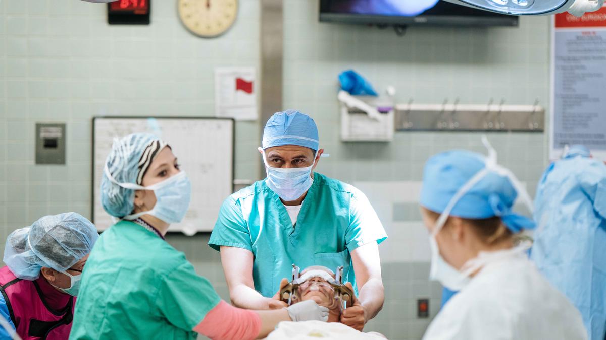 Ohio State's Dr. Ali Rezai performs deep brain stimulation surgery to ...