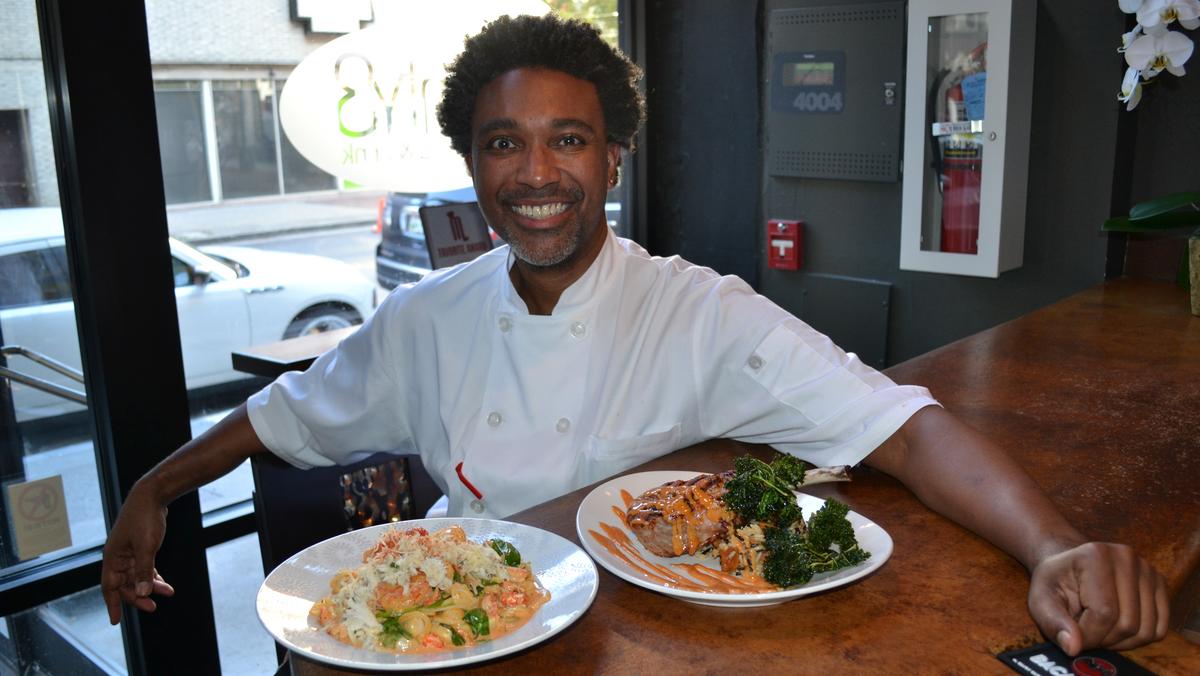 Chef Raymond Jackson of The Madison Hotel's Eighty3 putting his own ...