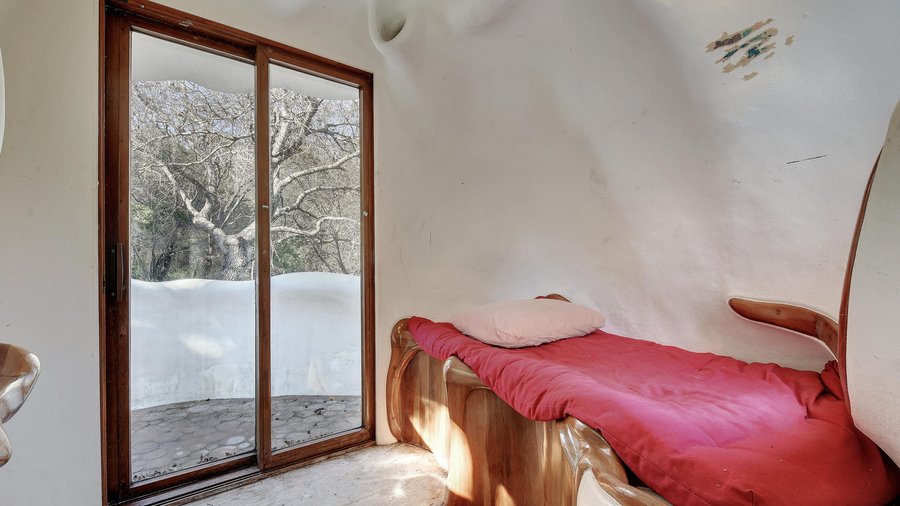 Look inside Austin's curvaceous, foam-built BloomHouse with artsy look ...