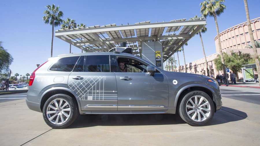 Uber halts all self-driving car tests after pedestrian struck and ...