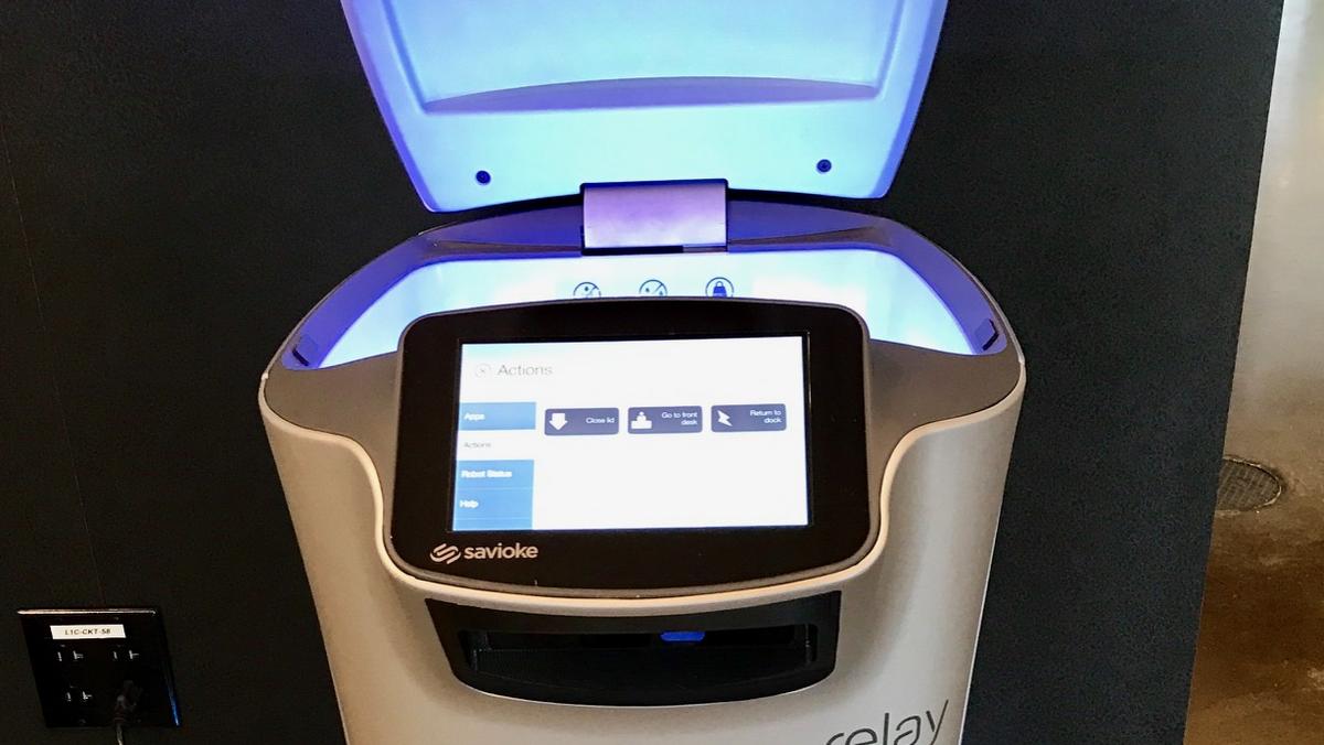 Meet the robot butler that brings wine and snacks to guests at the new ...