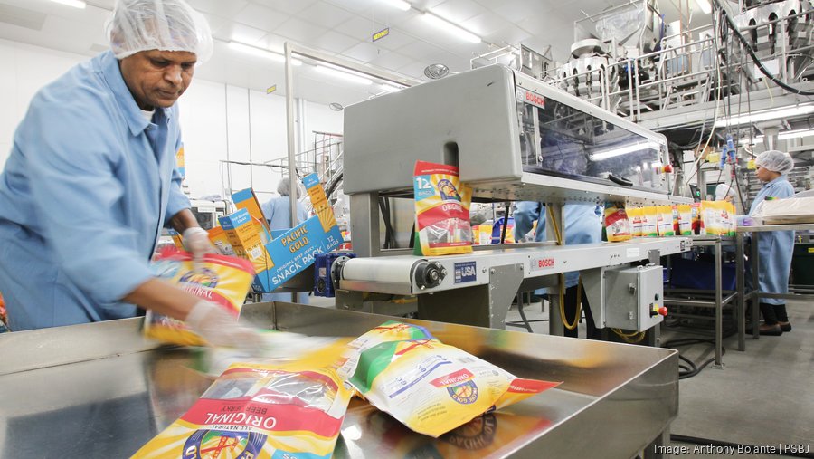 Tom Hernquist, Pres. and CEO of Oberto, gives he PSBJ a tour of his ...