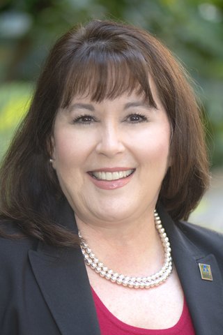 Kelly Davis of UT Arlington saw a job opening in the newspaper 20 years ...