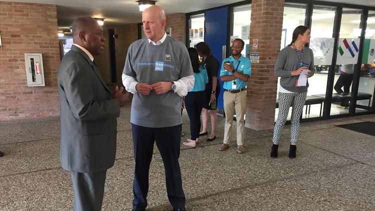 Goldman Sachs' David Solomon volunteers at Yes Prep Houston charter ...