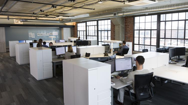 Corrigan Building hits 100% occupancy 1 year after redevelopment ...