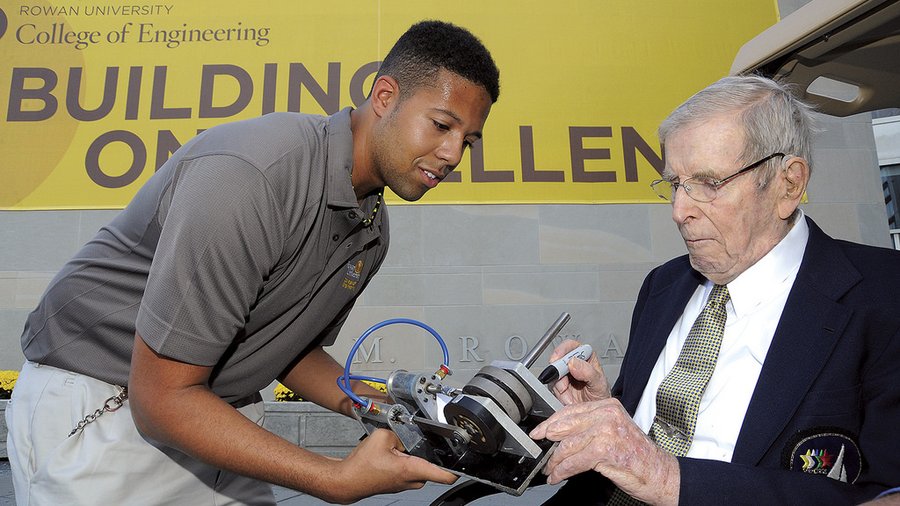 Henry Rowan signing student project