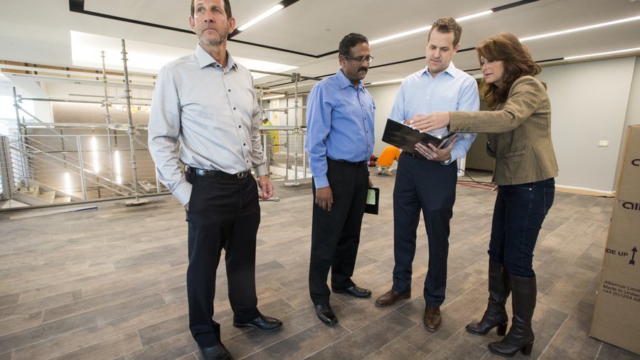 Behind the Scenes: CBRE brings in different look, workplace ethic with ...