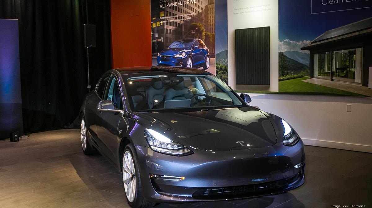 Tesla cuts dozens of salespeople amid shifting retail strategy ...