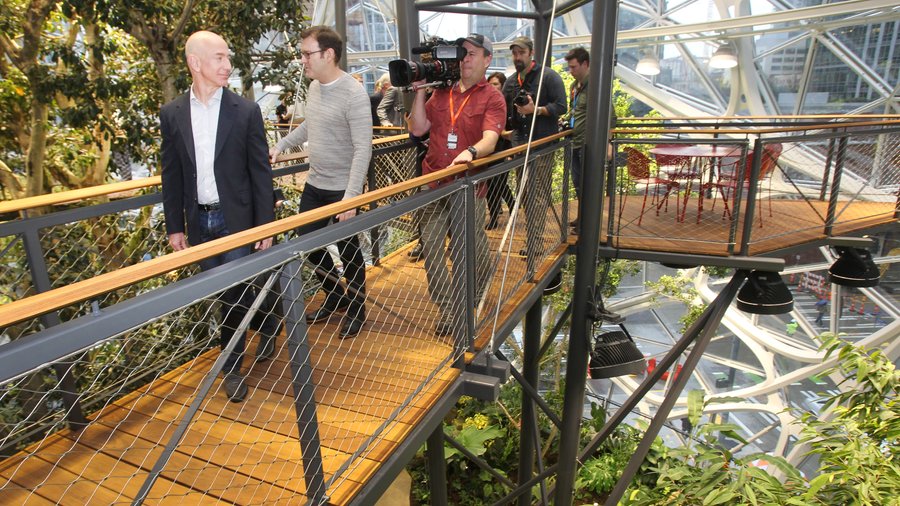 Amazon CEO Jeff Bezos opens iconic Spheres building with help from ...