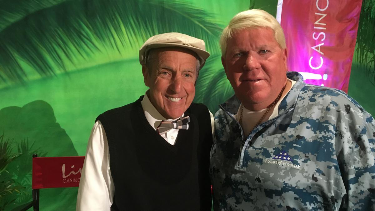 David Cordish duels golfer John Daly in promotional putting contest at ...