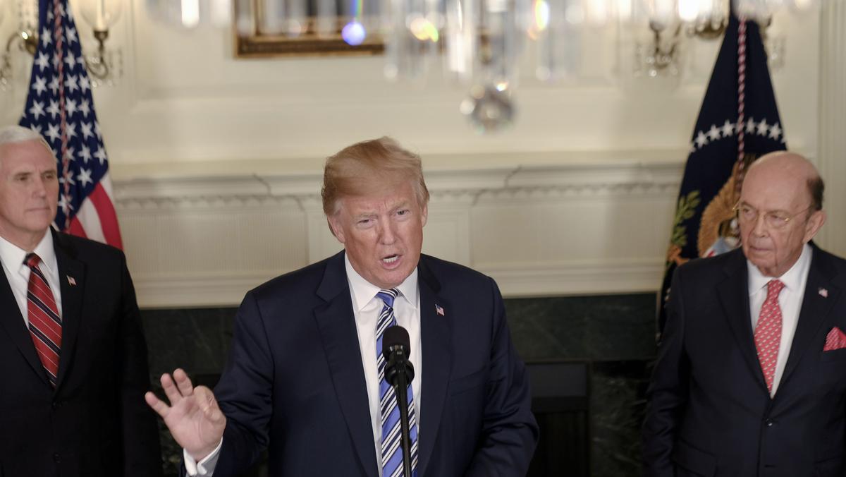 Trump Signs Spending Bill Reversing Veto Threat And Avoiding