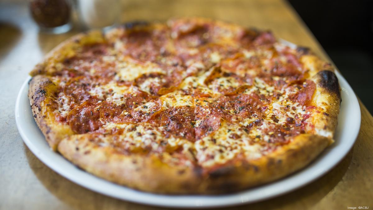 After record sales, Spin Pizza gives Dallas market a second shot for ...