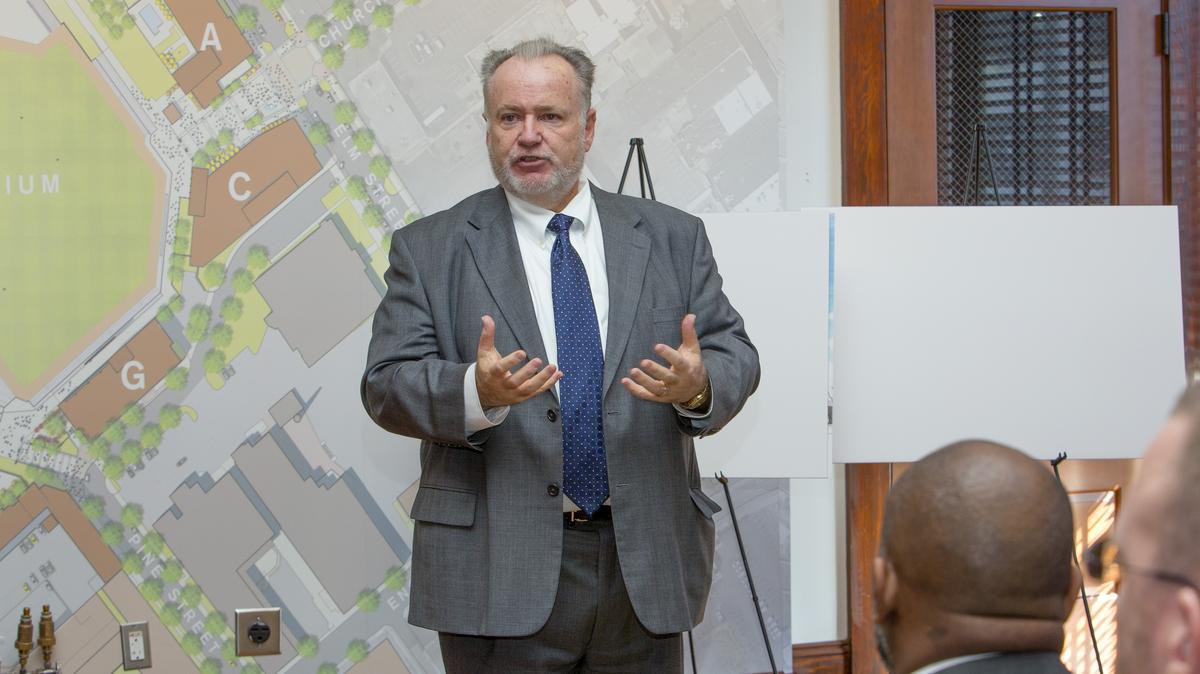 Tim Elliott details strategic design of stadium-inspired building in ...