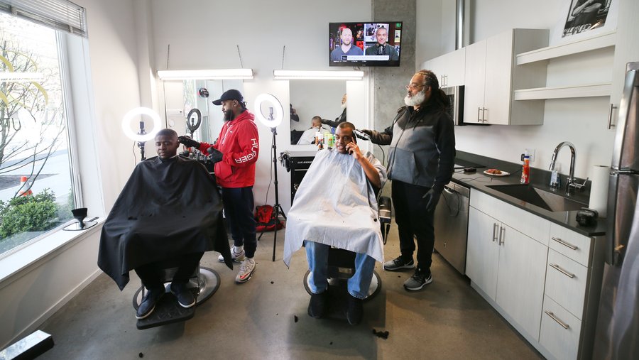 Barber Earl Lancaster of Seattle