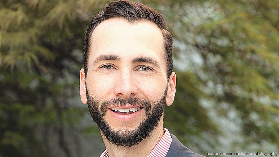 NCR's Evan Glover gets in the trenches for causes he supports - Atlanta Business Chronicle