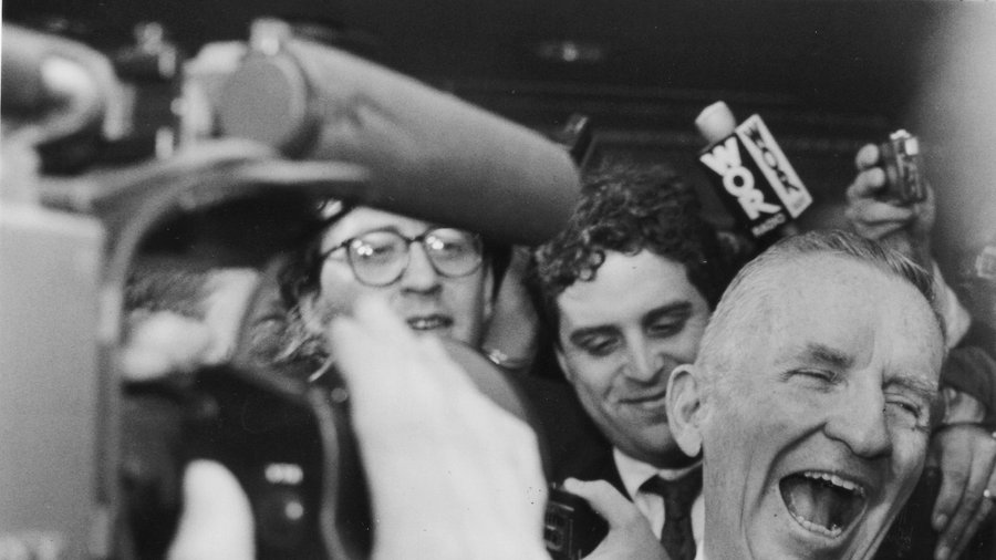 H. Ross Perot laughs with reporters in 1992