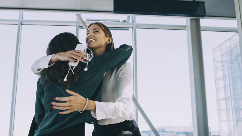 A Closer Look: Hug or handshake? - Bizwomen