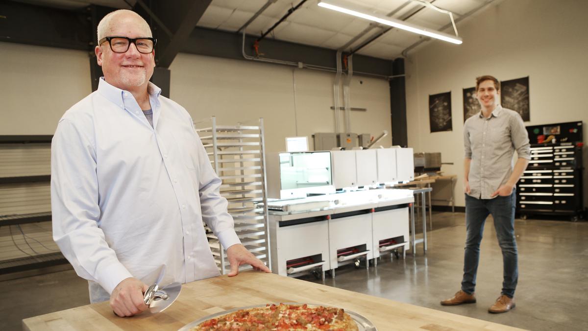 Automated pizza tech comes to T-Mobile Park - Puget Sound Business Journal
