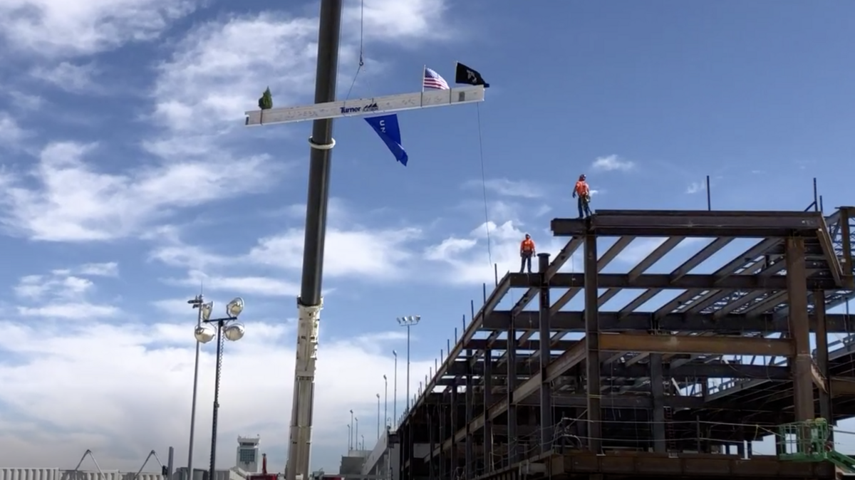 DIA celebrates milestone in gate expansion project - Denver Business ...