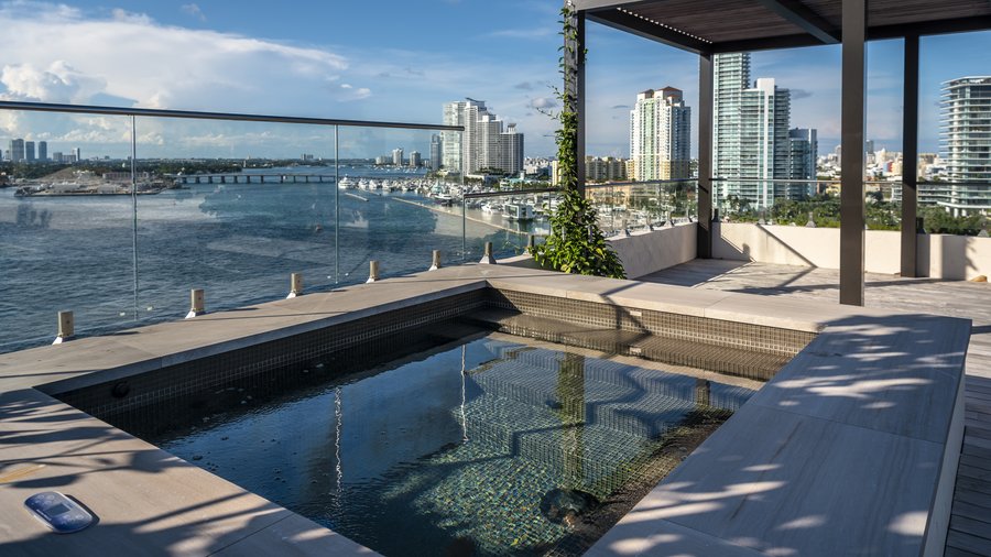 Maxim Group CEO Michael Rabinowitz buys Fisher Island condo as NY ...