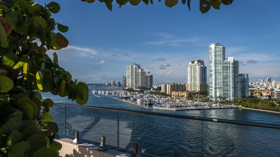 Jeffrey W. Martin of Sempra Energy buys Fisher Island Miami condo from ...