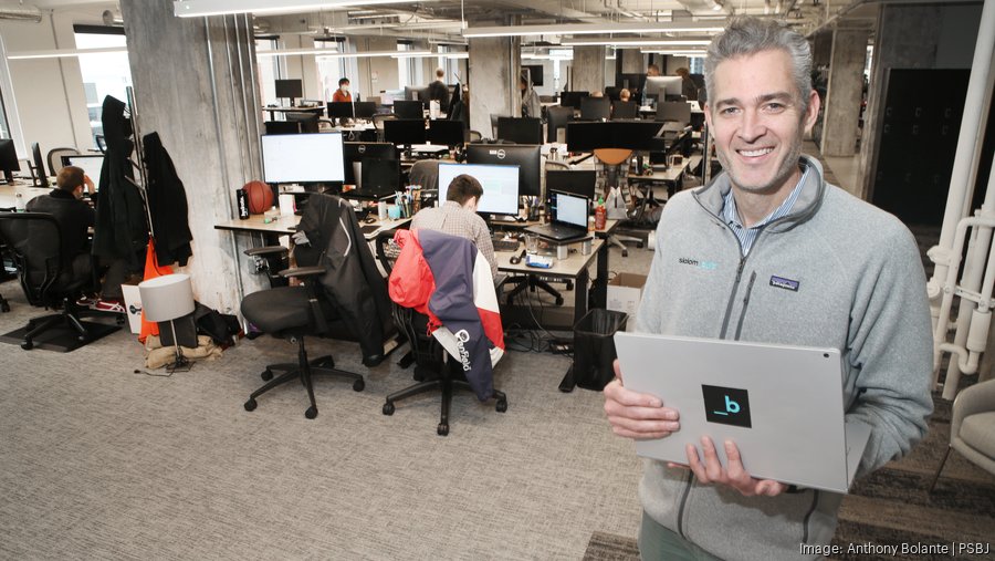Slalom expands into another floor of Seattle Exchange Building (Photos ...