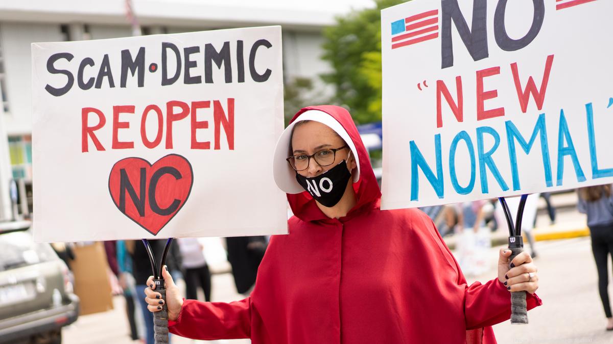 Protesters say no to 'new normal' at ReOpenNC rally - Triangle Business ...