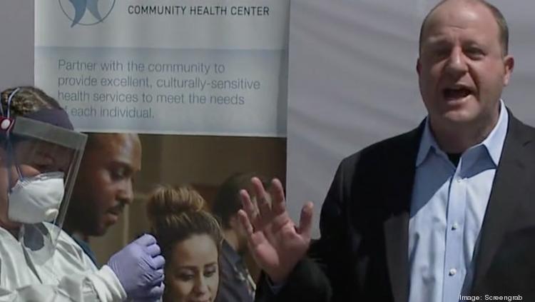 Colorado business group launches legal attack on Polis' signature ...