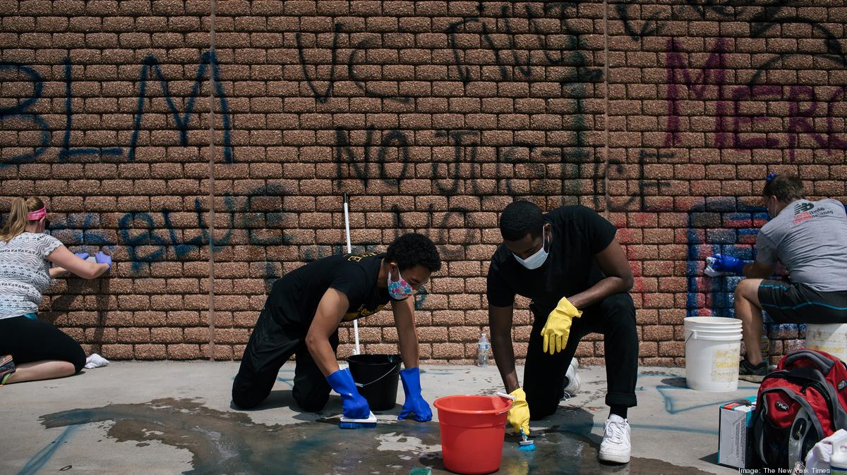 In cities battered by protest, the cleaning crews come out - Memphis ...