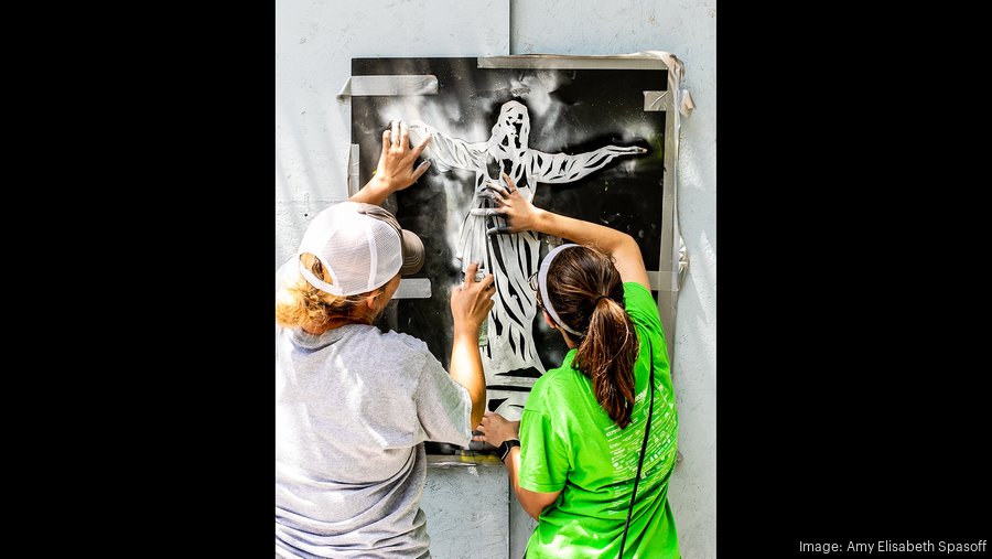 Artists cover boarded-up OTR businesses with murals: PHOTOS ...