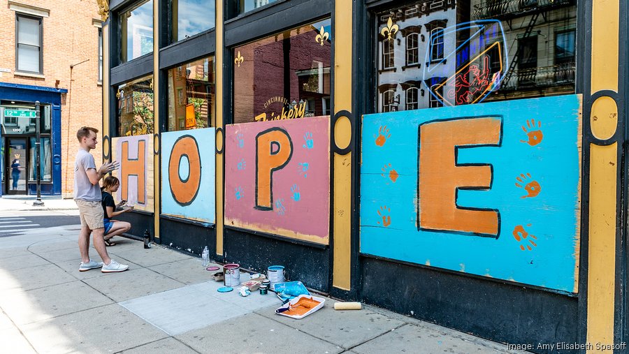 Artists cover boarded-up OTR businesses with murals: PHOTOS ...