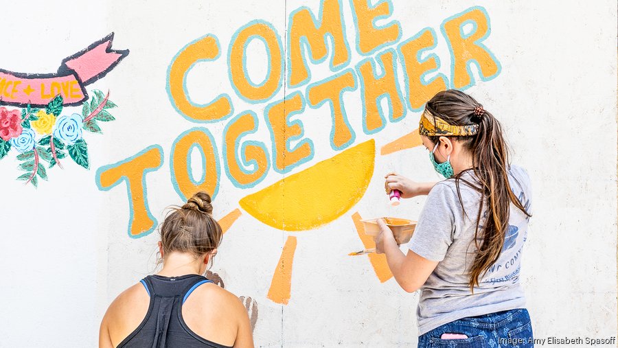 Artists cover boarded-up OTR businesses with murals: PHOTOS ...