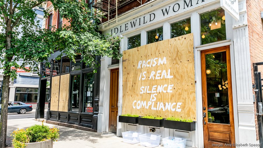 Artists cover boarded-up OTR businesses with murals: PHOTOS ...
