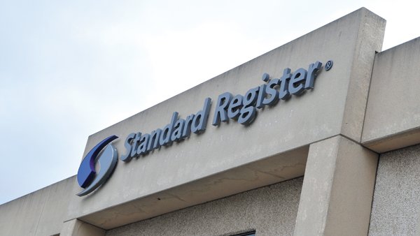 Standard Register posts $23M loss; shares down 31%