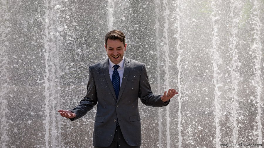 PHOTOS: Corporate execs get soaked for a good cause in PPG Fountain ...
