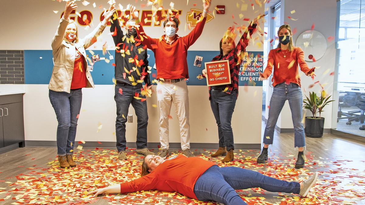 PHOTOS: Kansas City office workers rev up Red Friday celebrations ...