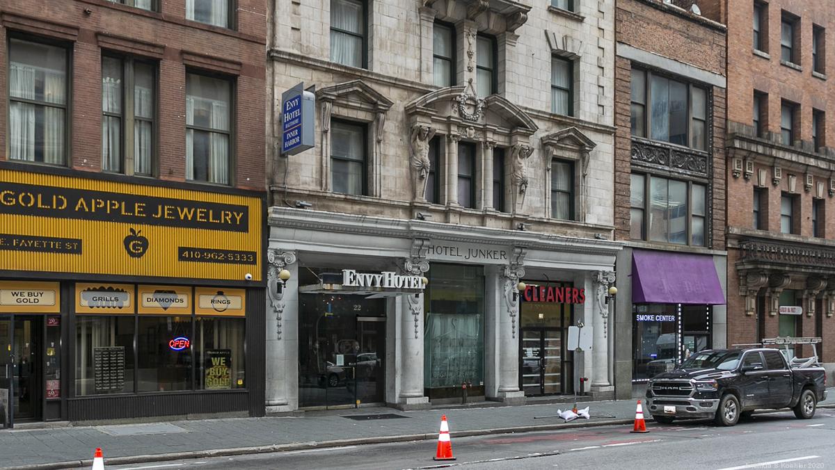Downtown's historic Envy Hotel changes hands to local apartment ...