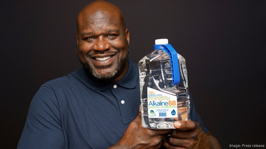 Shaquille O Neal Holding A Water Bottle