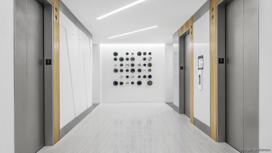 As employees return, Weitzman shows off newly renovated headquarters ...