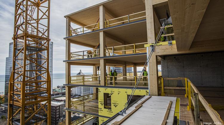 Ascent mass timber building reaches record-setting height with topping ...