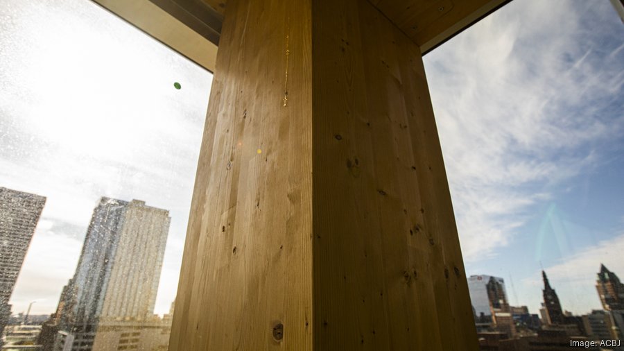 Ascent mass timber building reaches record-setting height with topping ...
