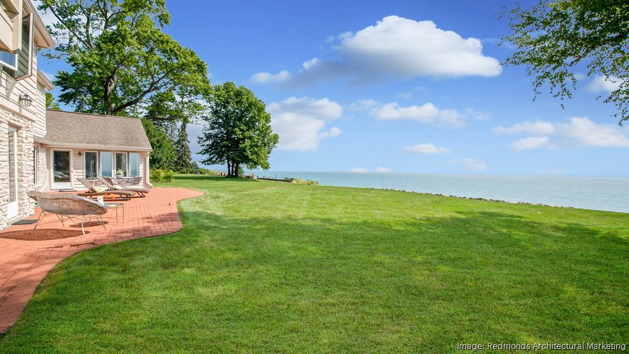 Picturesque Fox Point home with boat launch on Lake Michigan listed at ...