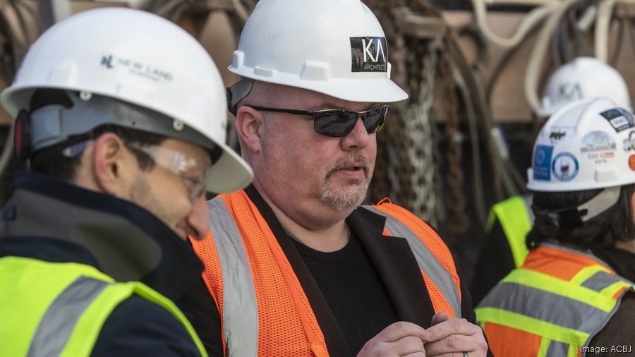 Ascent mass timber building reaches record-setting height with topping ...