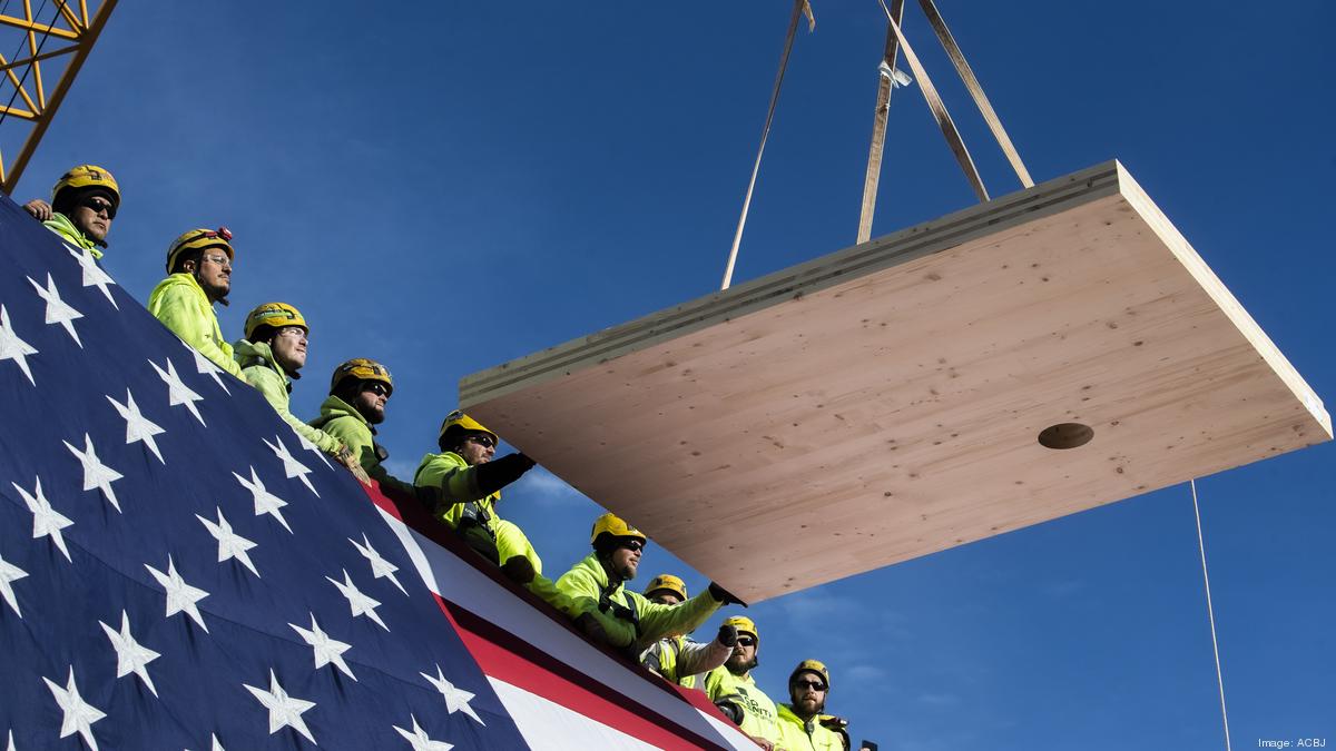 Ascent mass timber building reaches record-setting height with topping ...