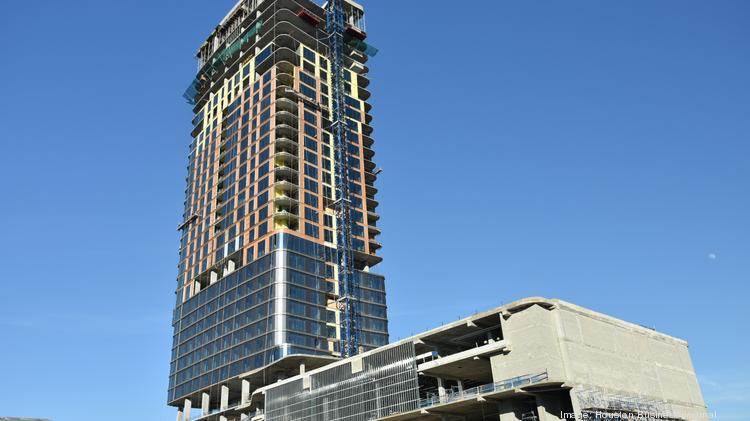 DC Partners' The Residences at The Allen hotel-condo tower tops out ...
