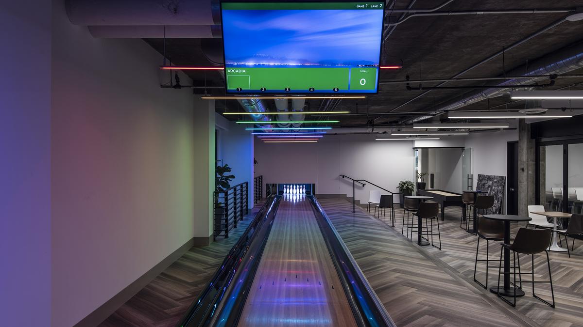 Arcadia Management Group unveils renovated office space with bowling ...
