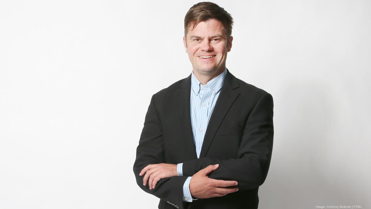 Lewis Johnson, Photonics, named PSBJ 40 Under 40 honoree - Puget Sound Business Journal